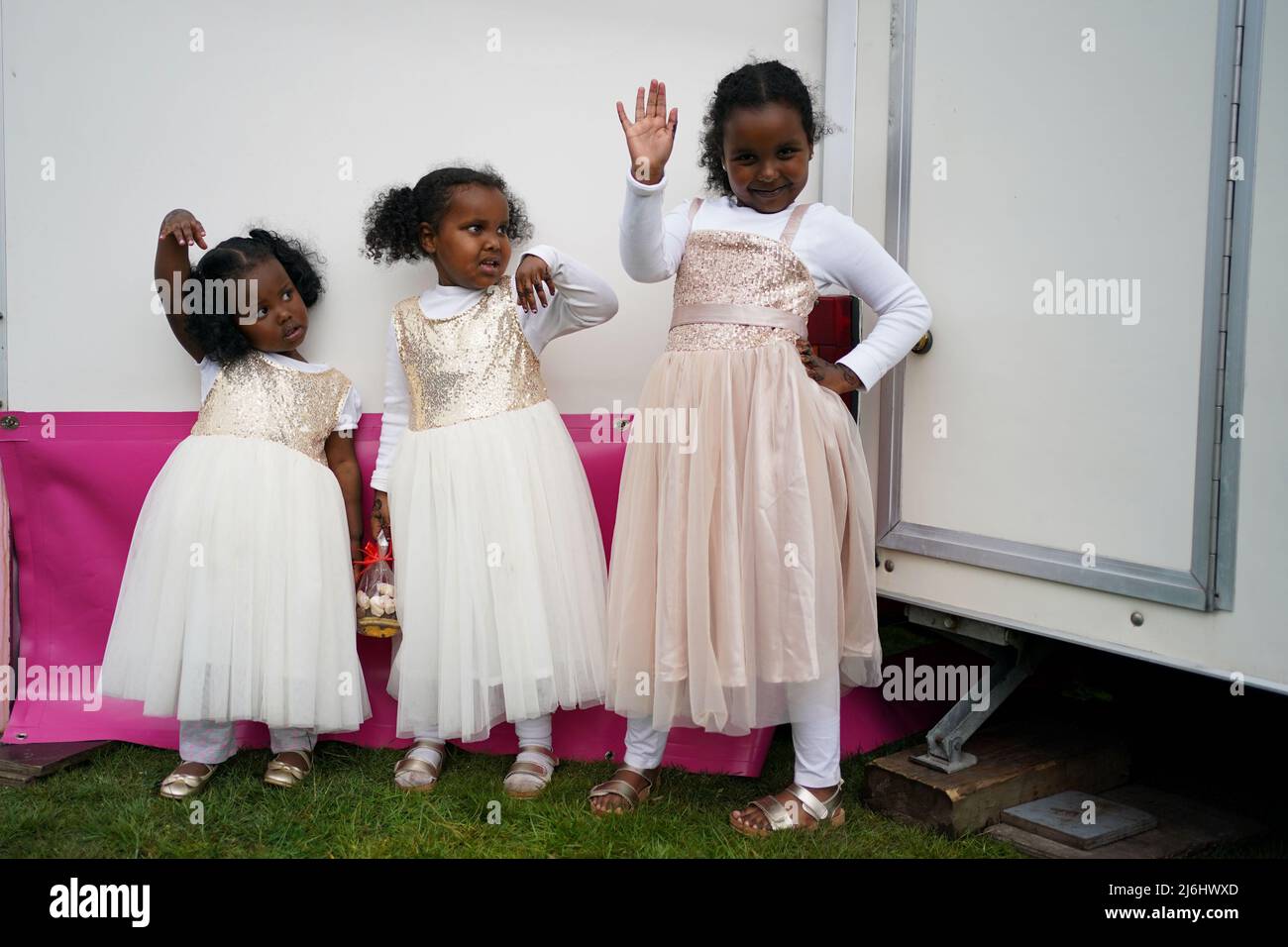 Sisters Rayaan 2, Remla 3, and Ruwayda 6, pose for a photograph at ...