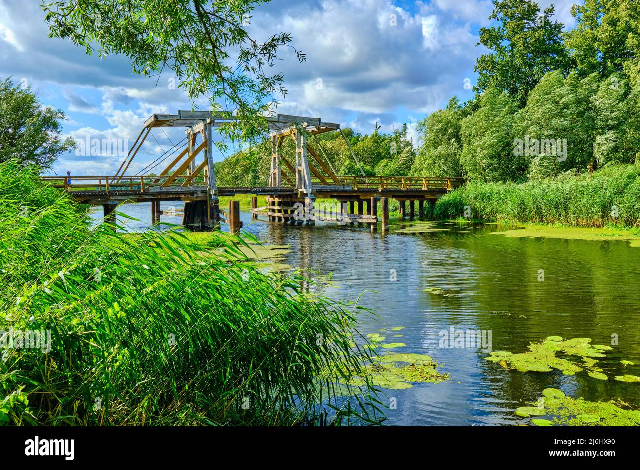 Listed wooden bascule bridge spanning the Trebel near Nehringen ...
