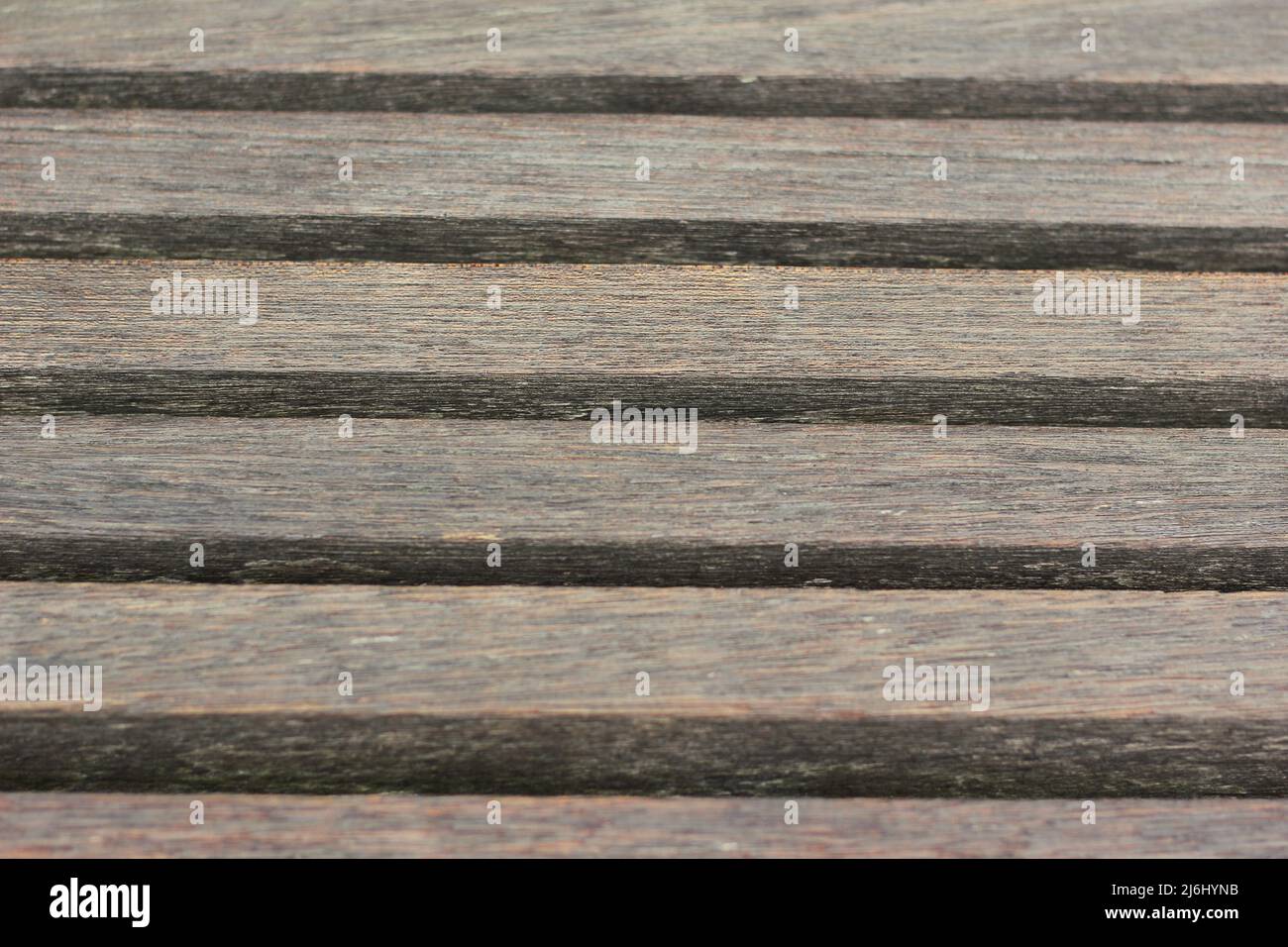 Strong lines amongst the wooden slats Stock Photo - Alamy