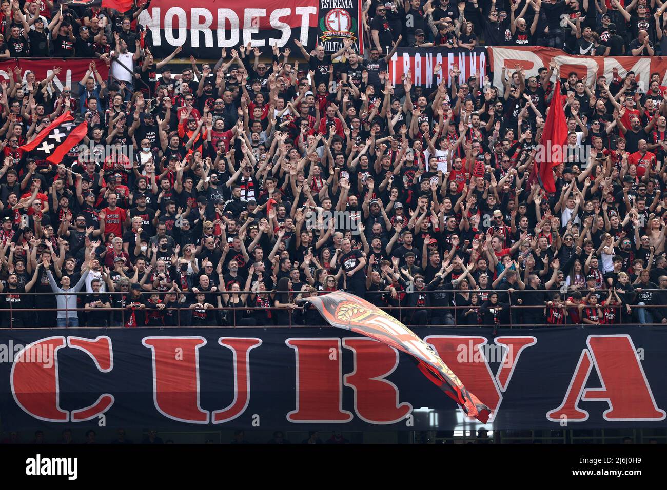 AC Milan fans support the team during the italian soccer Serie A match ...
