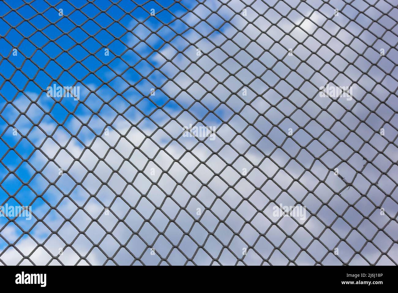 rope mesh against the blue sky in sunny weather Stock Photo - Alamy