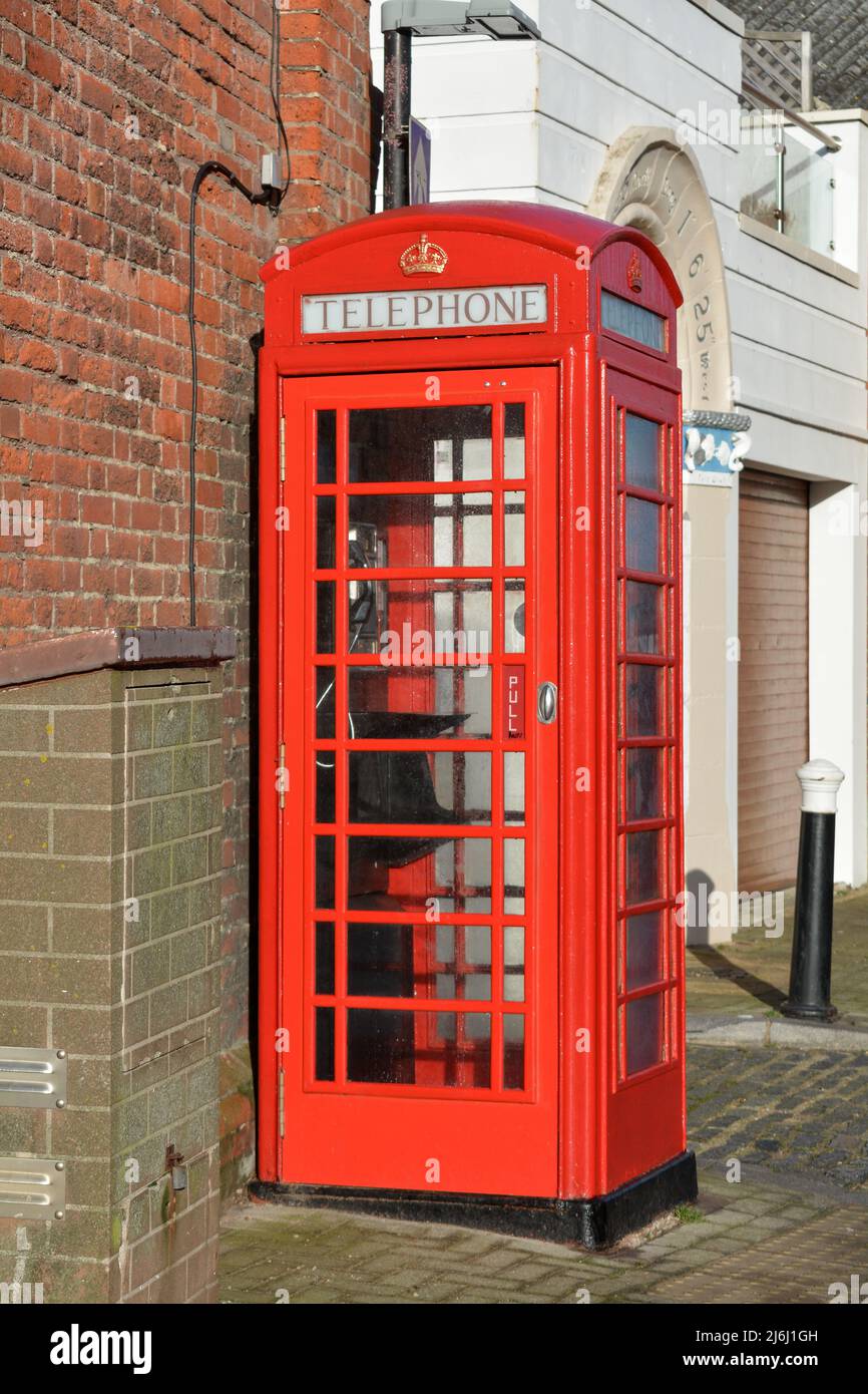 Red british traditional telephone box hi-res stock photography and ...