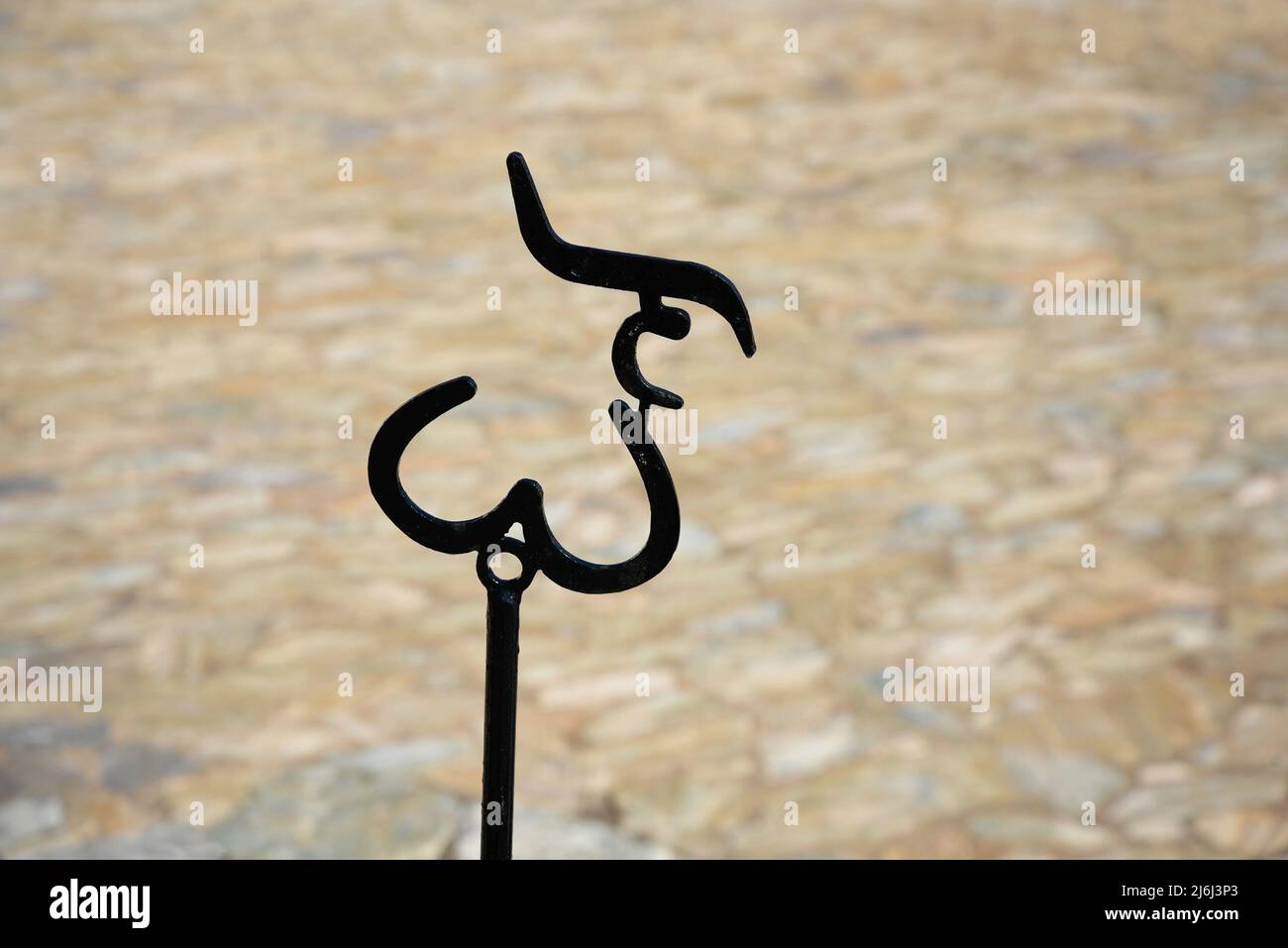 Handcrafted wrought iron Greek alphabet symbols found on the grounds of ...