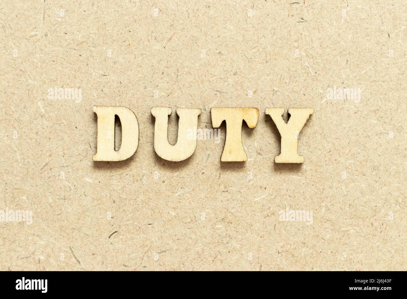 Alphabet letter in word duty on wood background Stock Photo - Alamy