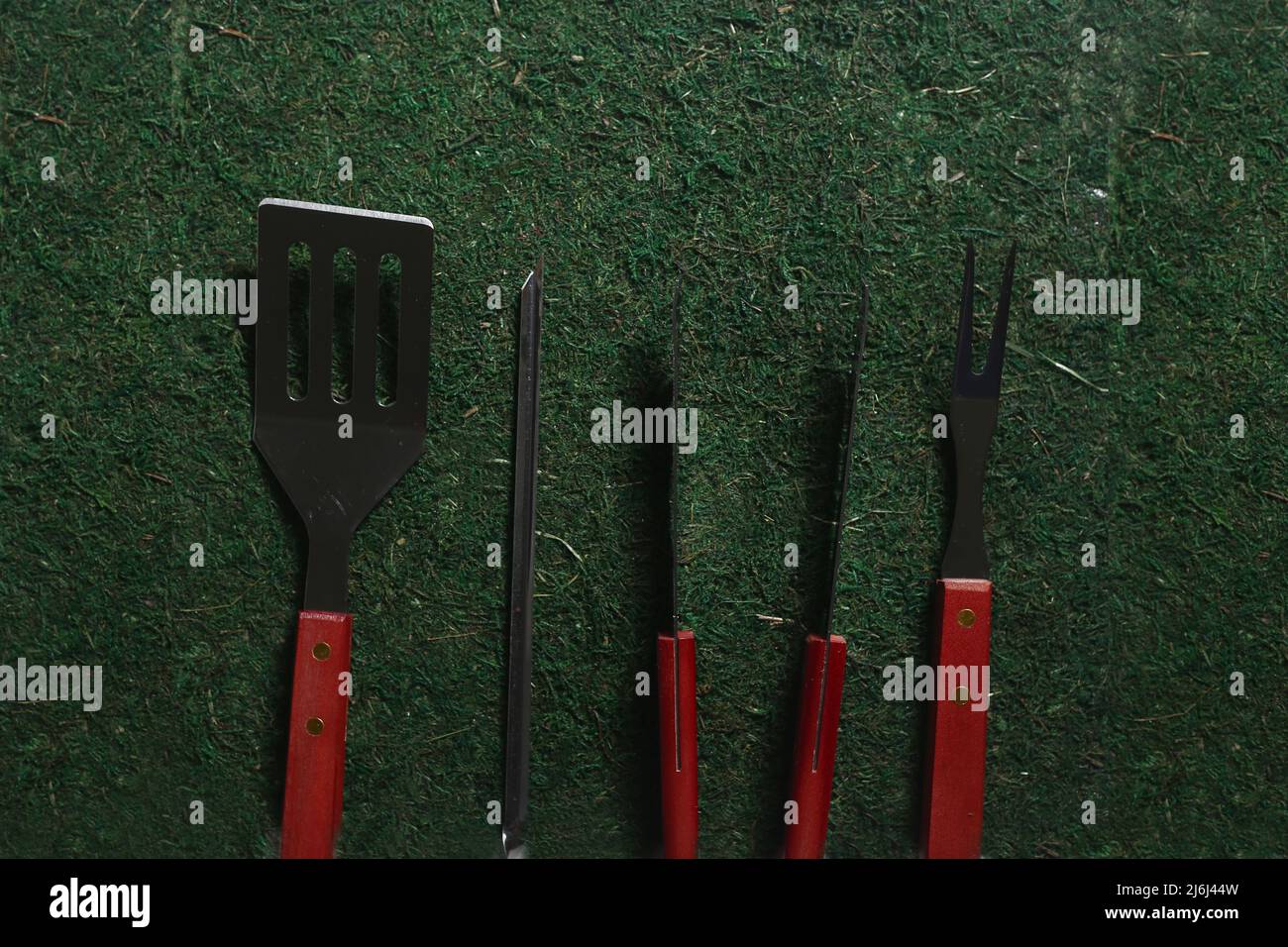 BBQ instruments kit - tongs, spatula, fork, skewer - close up isolated ...