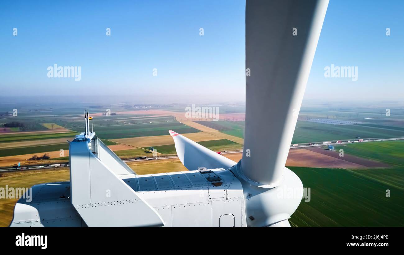 Aerial view of part of windmill turbine in countryside, Green energy ...