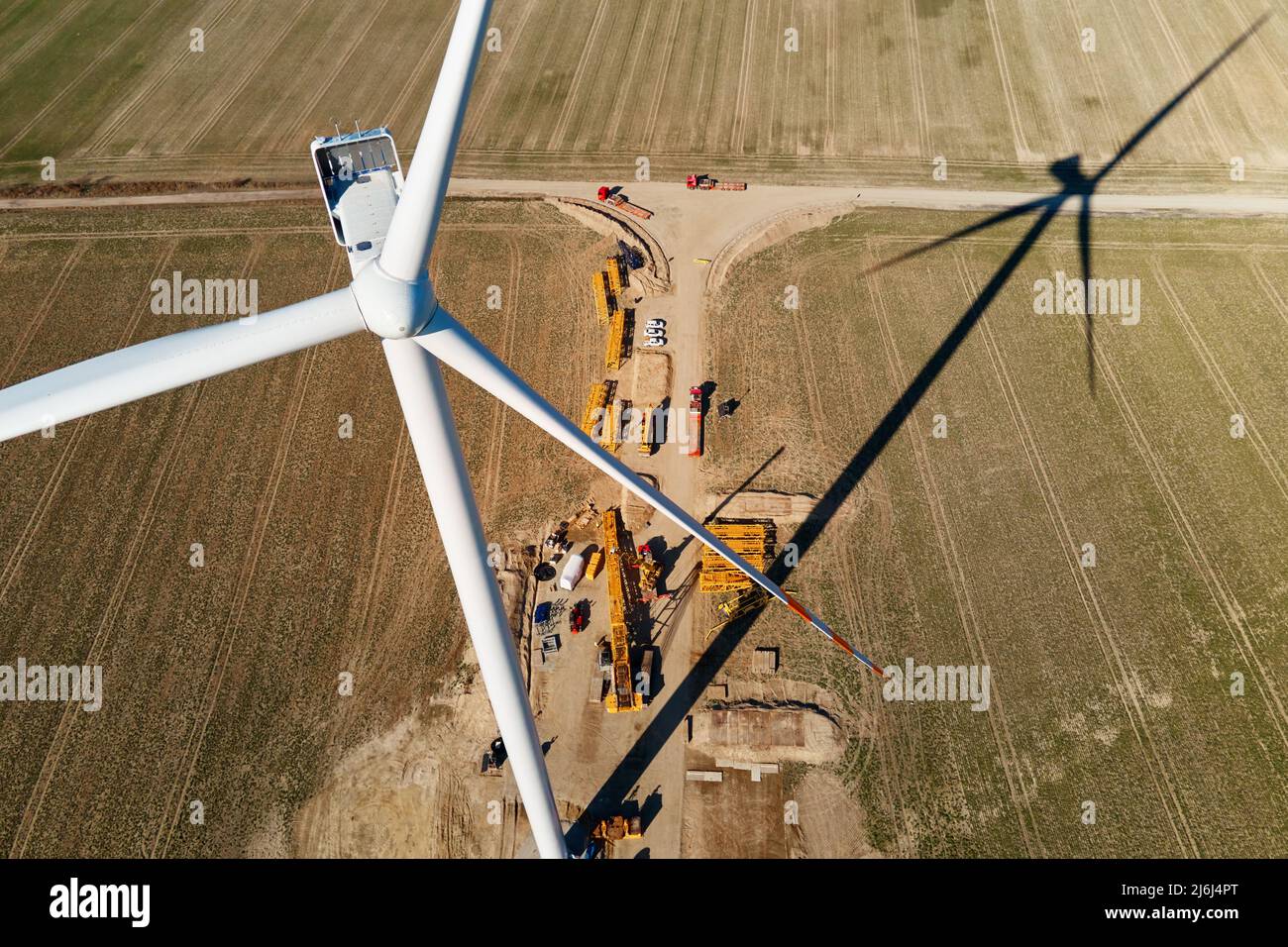 Construction site near windmill turbine, Wind generator installing ...