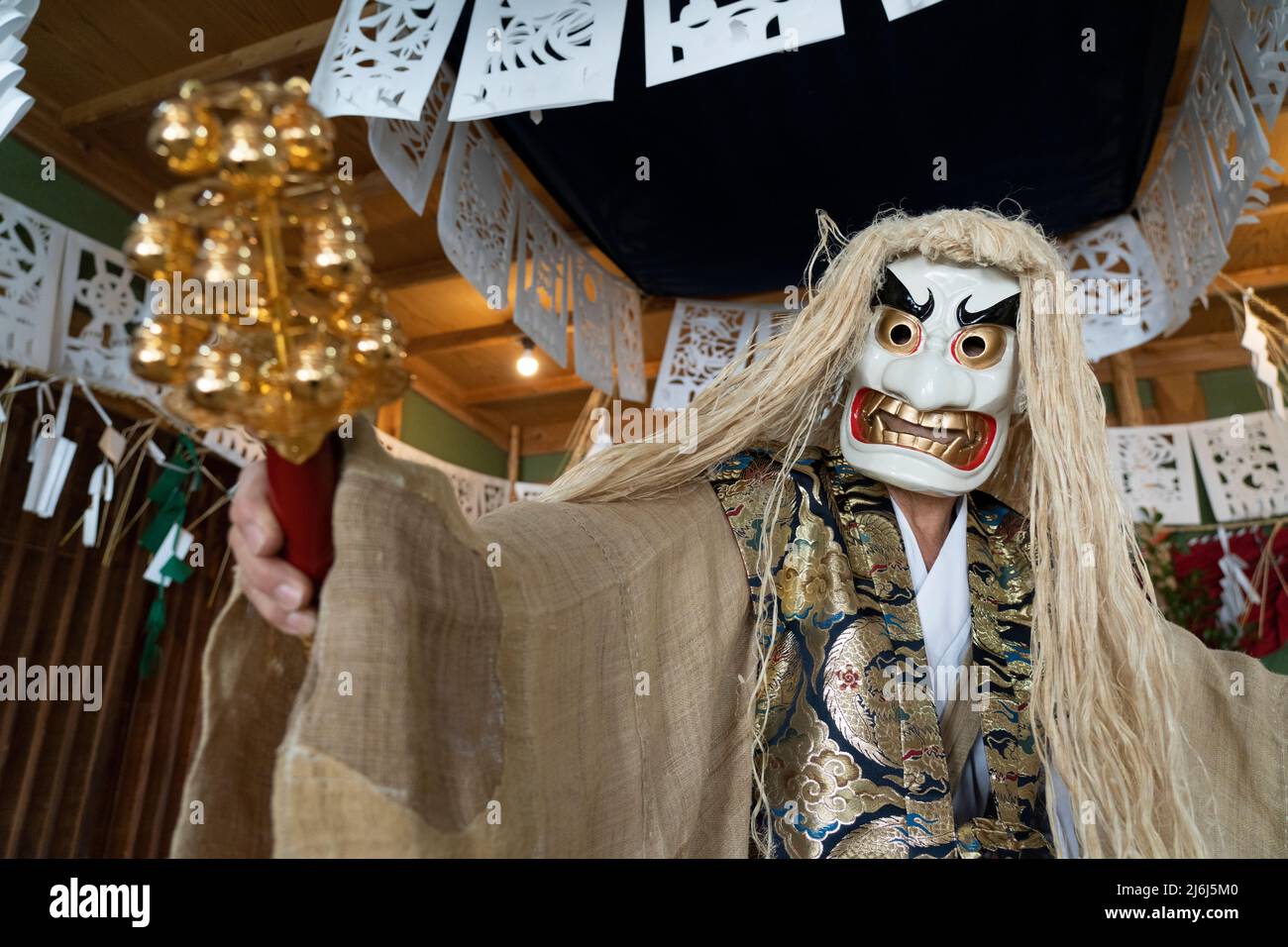Fujisaki-san, a master of Kagura the Shinto ritual performance telling ...