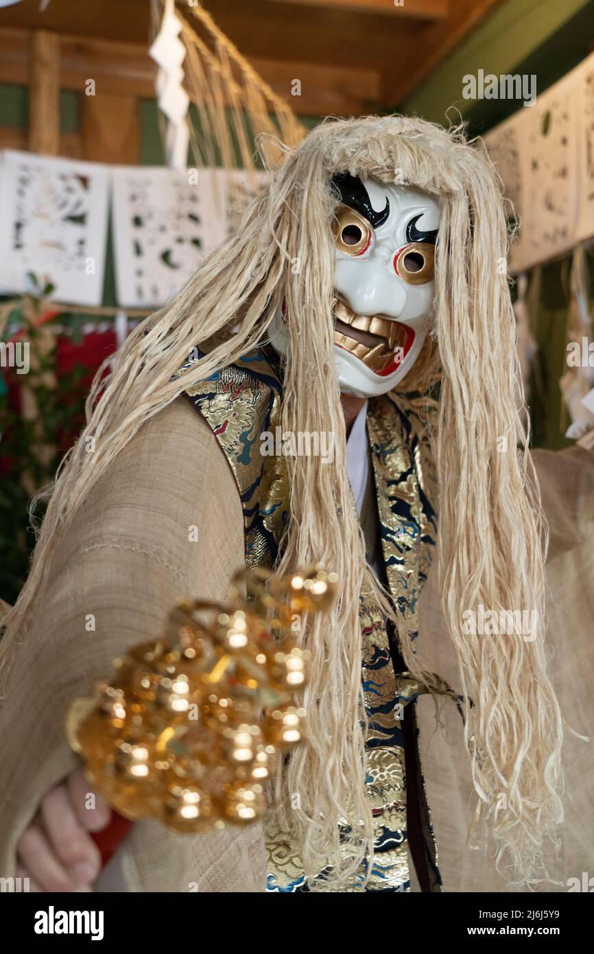 Fujisaki-san, a master of Kagura the Shinto ritual performance telling ...