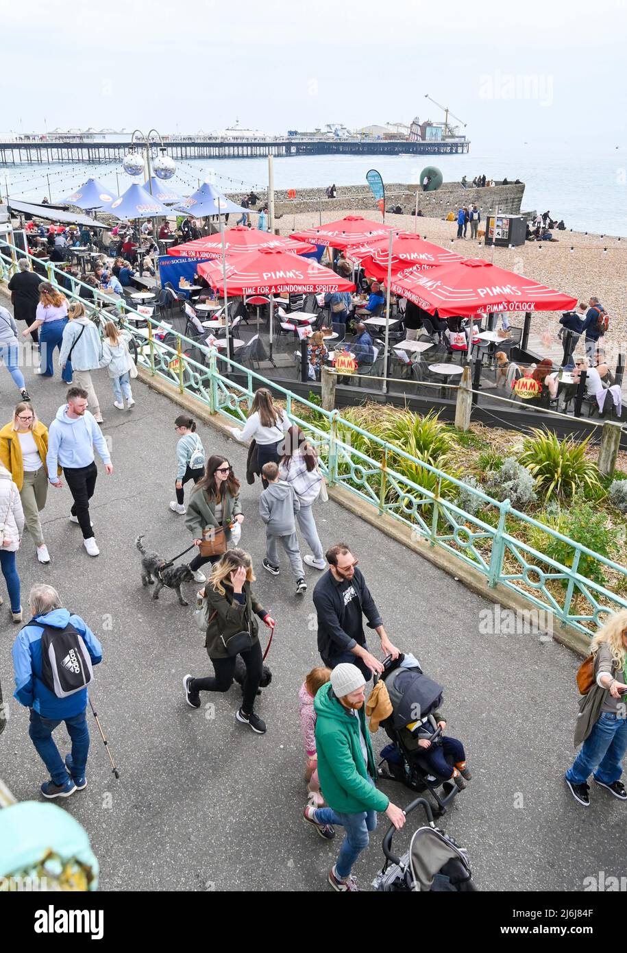 Brighton UK 2nd May 2022 - Bank Holiday crowds enjoy a mix of sunshine ...