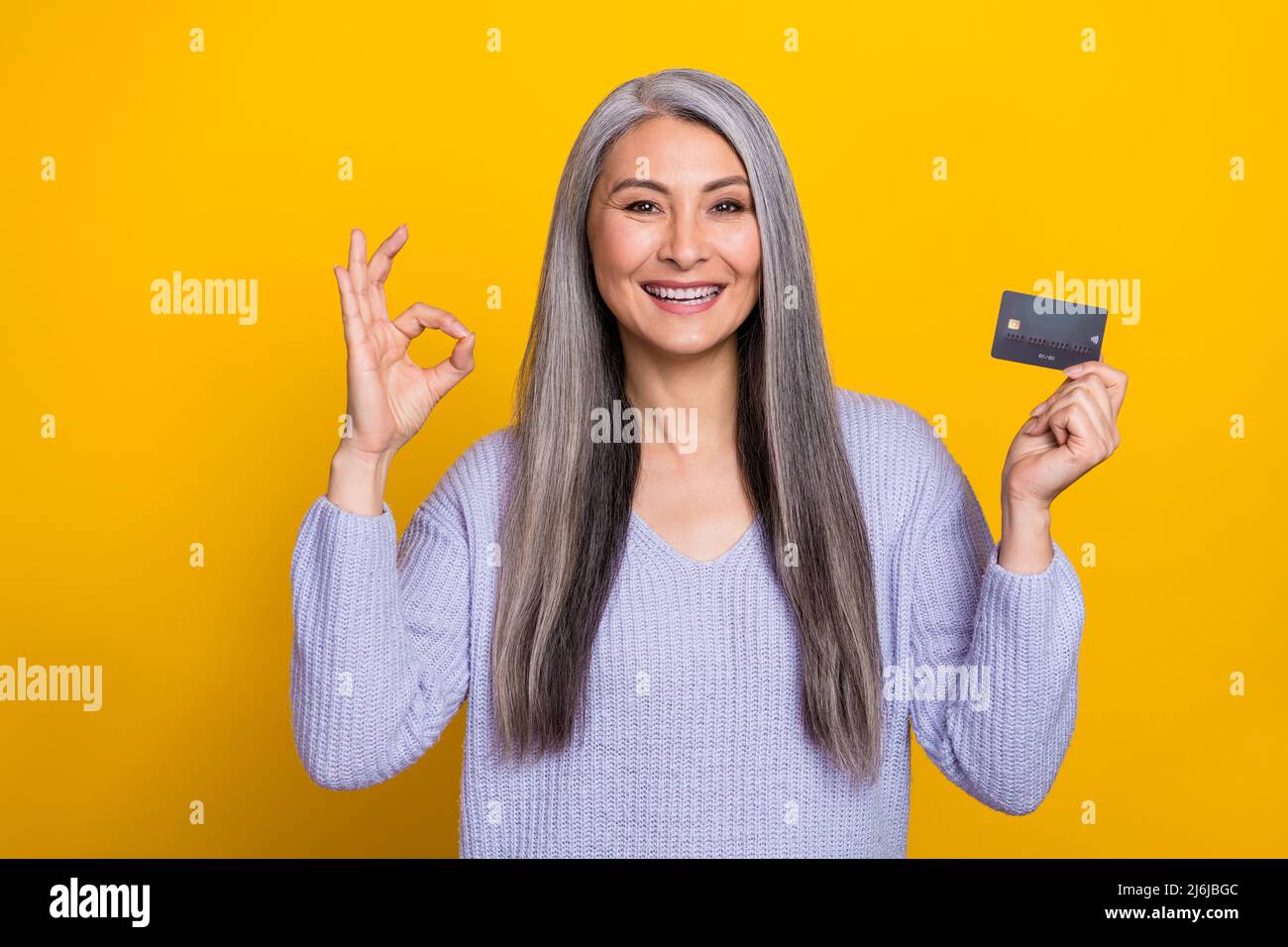 Photo of retired lady in casual style sweater approve banking system ...
