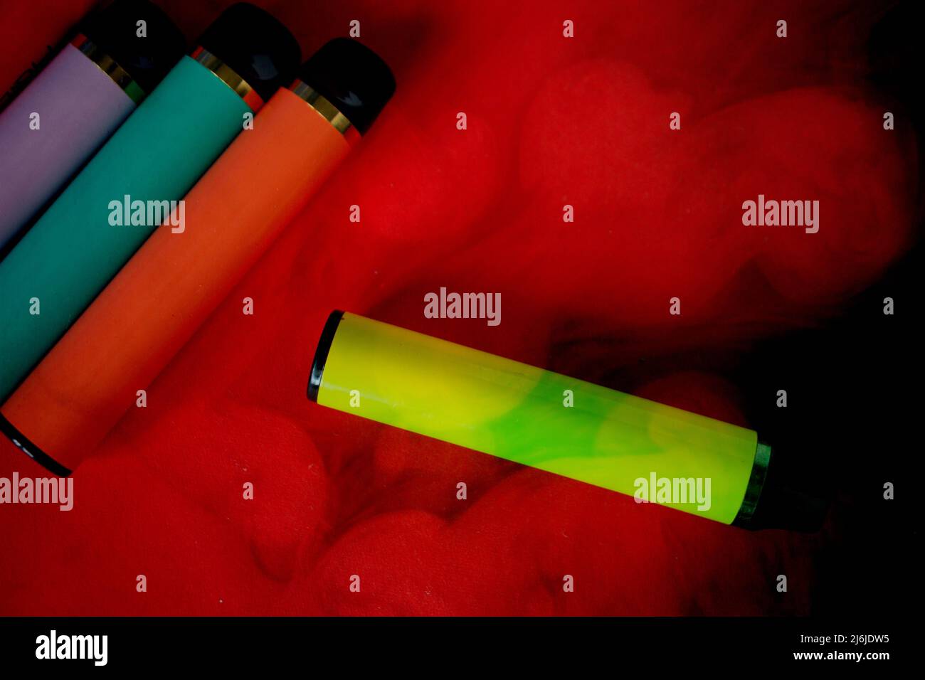 Colorful electronic cigarettes with copy space Stock Photo - Alamy