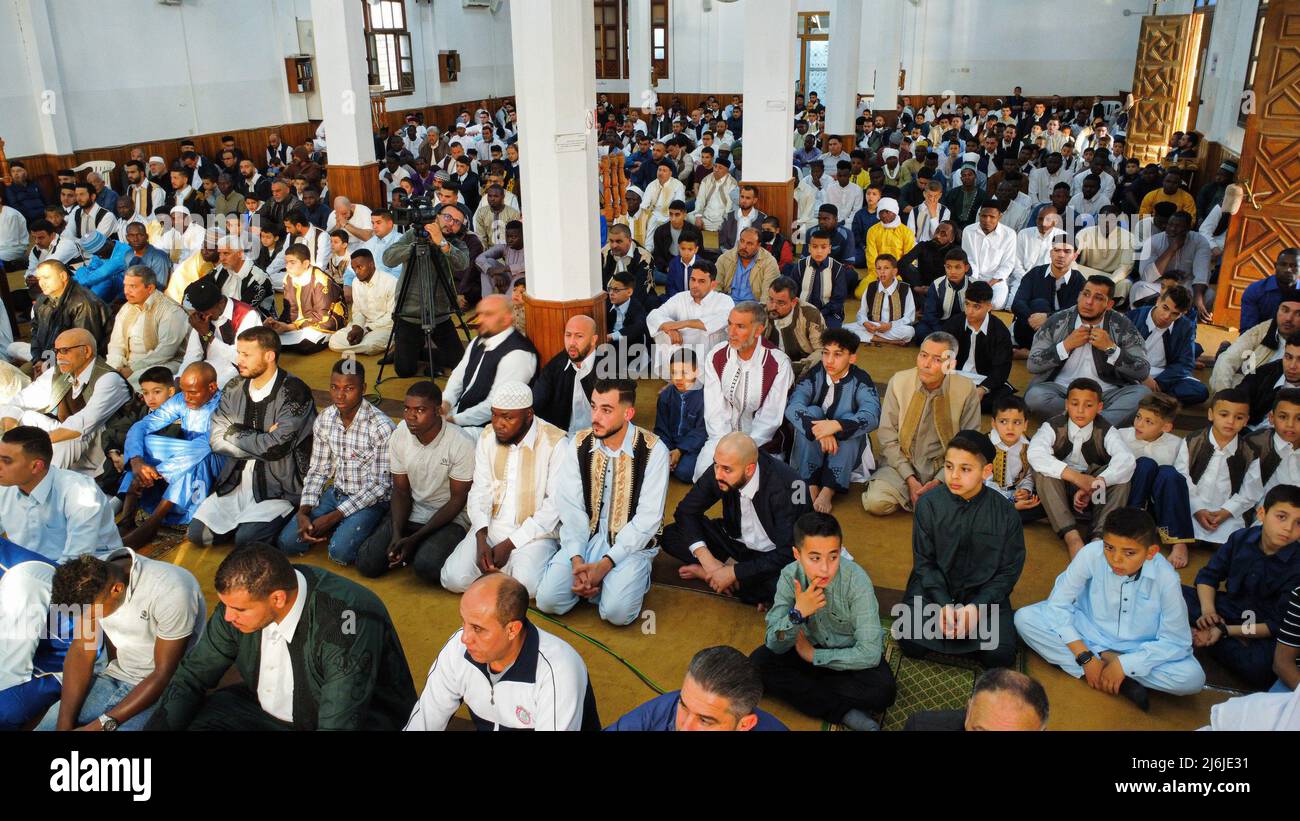Muslims attend Eid al-Fitr prayers marking the end of the holy fasting ...