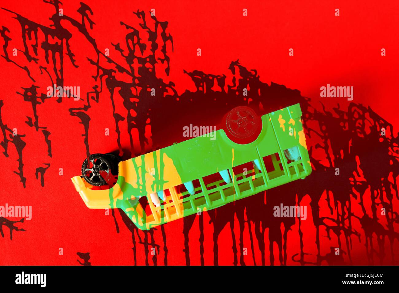 Accident with shcool bus concept. Toy bus upside down Stock Photo - Alamy
