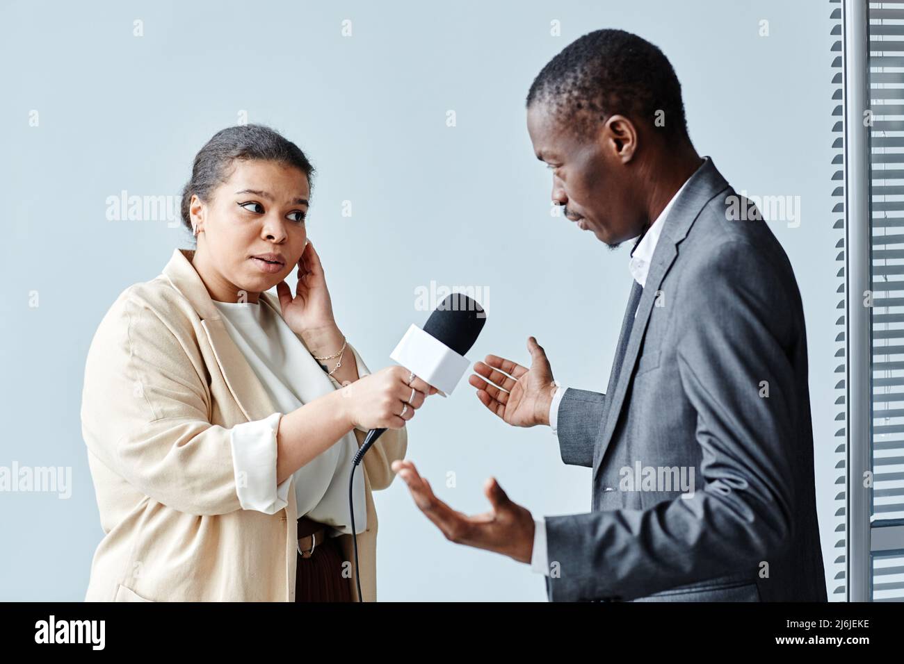 Side view portrait of African American young woman interviewing ...