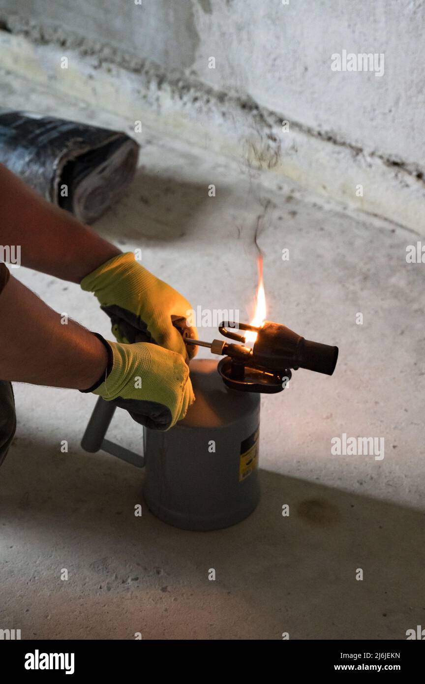 Gasoline blowtorch with a burning fire, the use of a blowtorch in ...