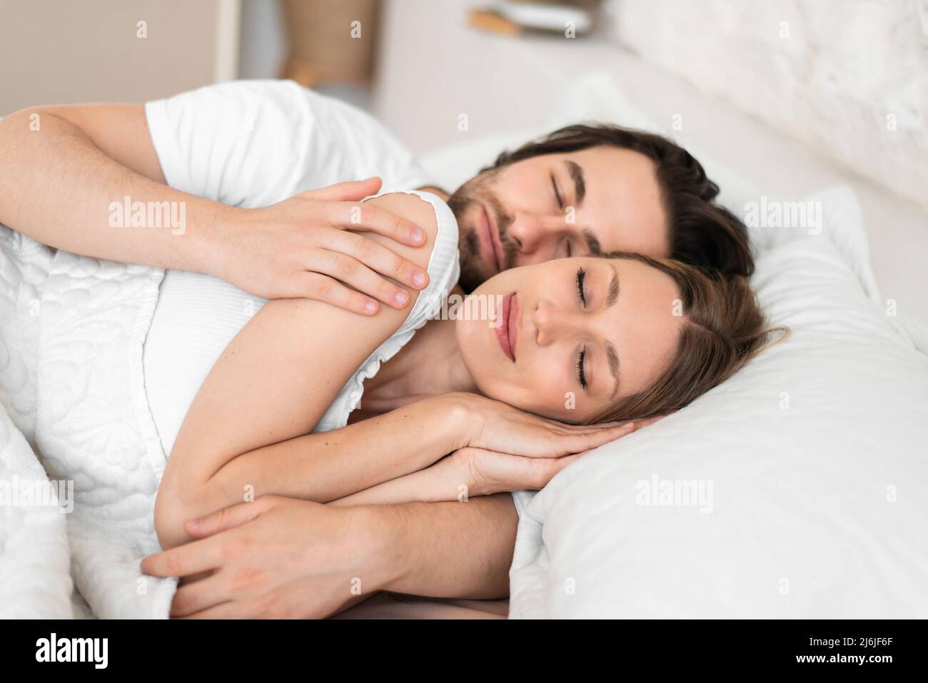 Young romantic couple sleeping on hi-res stock photography and images ...