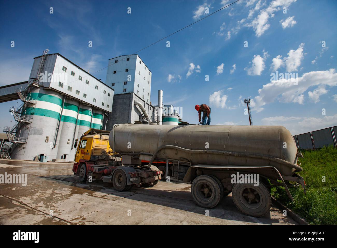 Standard Cement plant. Concrete silos and industrial buildings. Cement ...