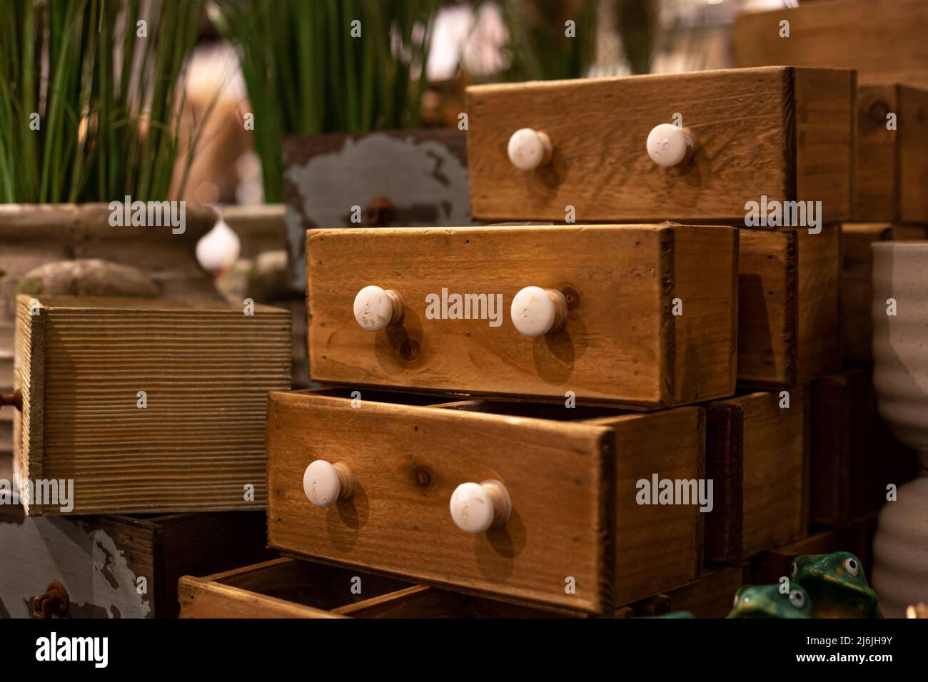 Close-up, wooden boxes for the house, home decor detail Stock Photo - Alamy