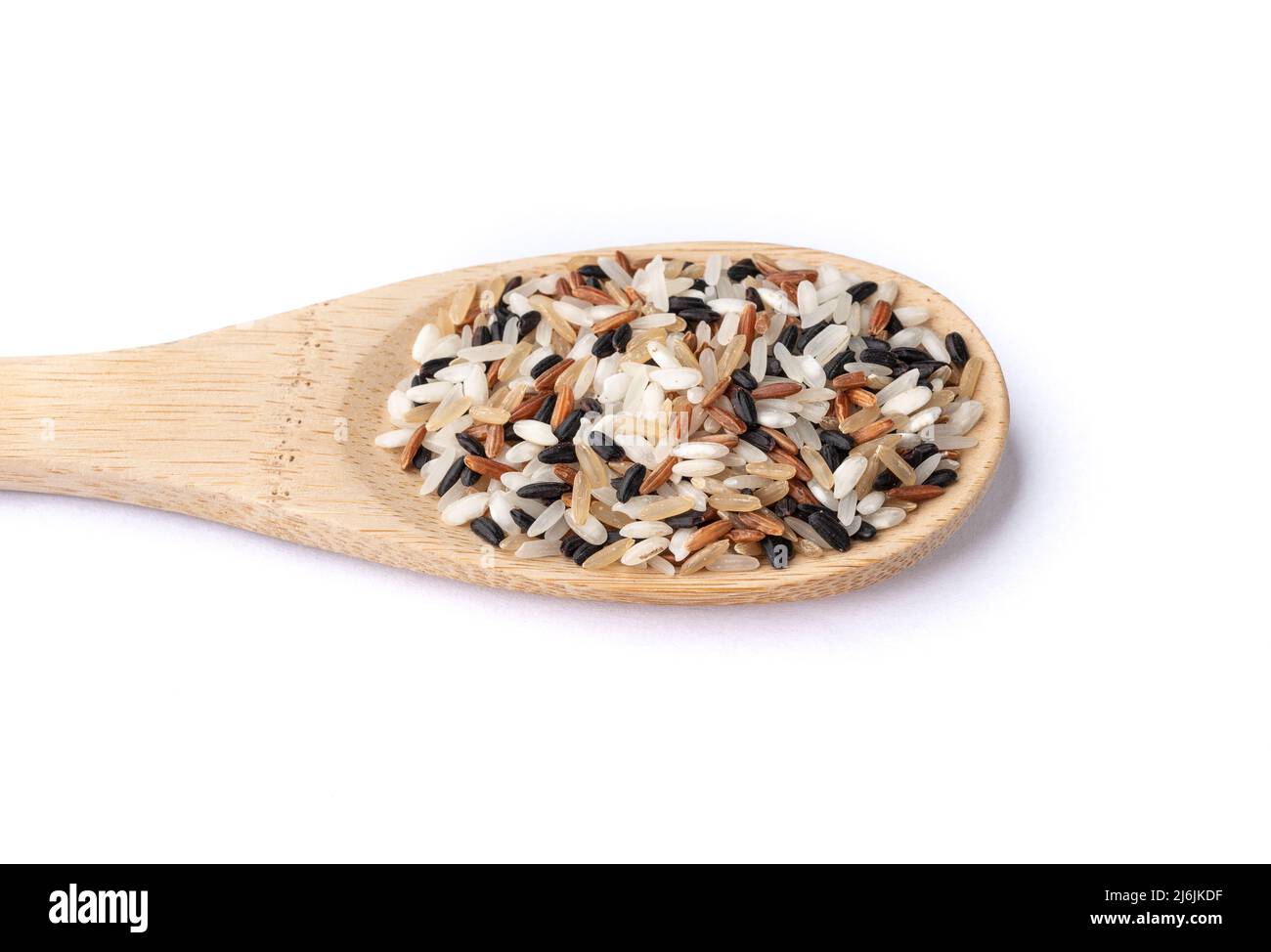 Raw assorted rice in a spoon isolated over white background Stock Photo ...
