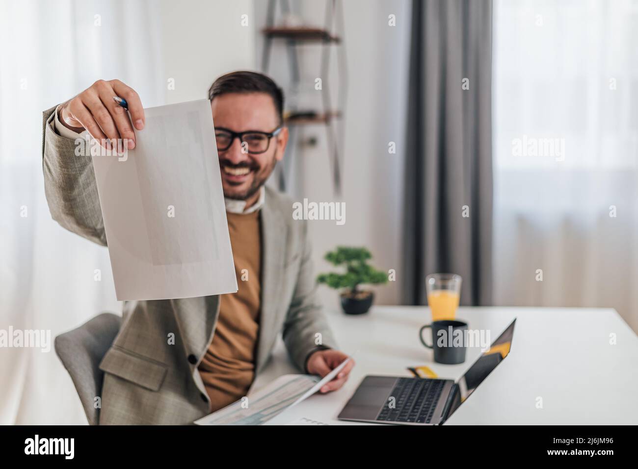 Office desk reports laptop hi-res stock photography and images - Alamy