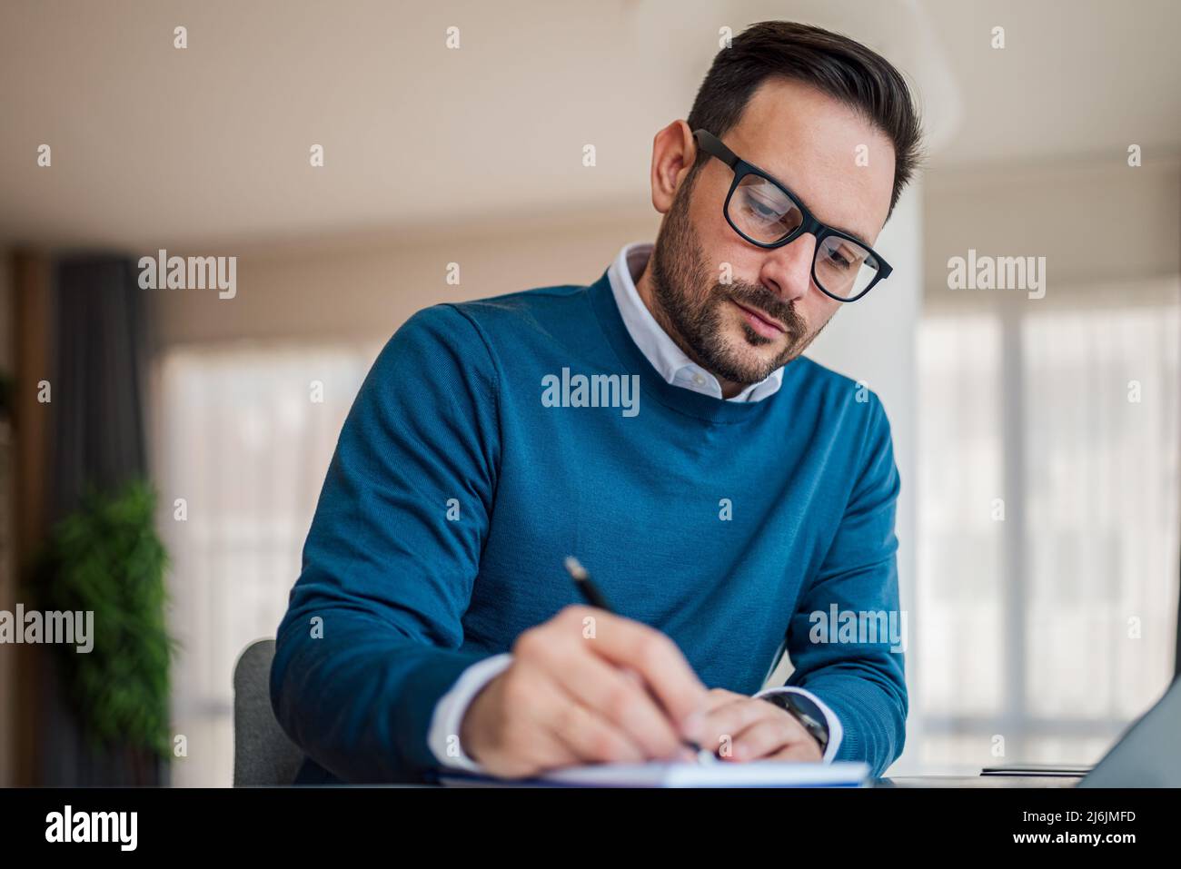Sweater and desk hi-res stock photography and images - Alamy