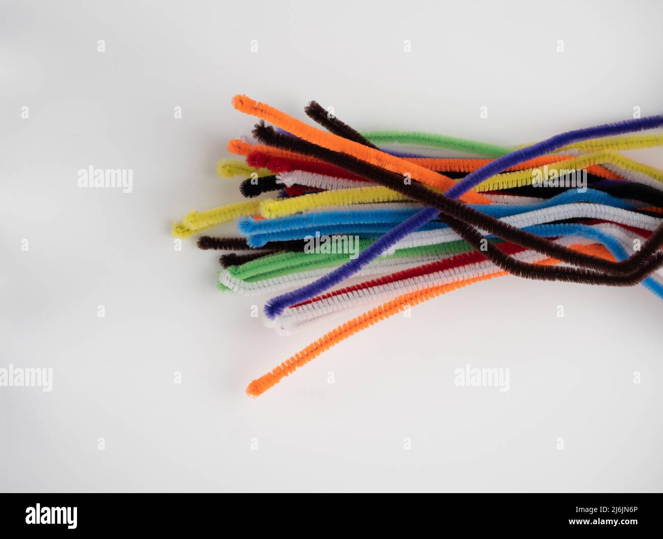 small collection of colored pipe cleaners isolated Stock Photo - Alamy