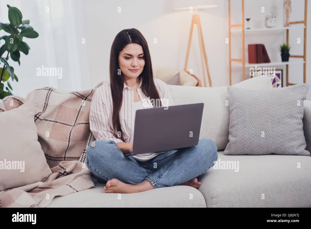 Portrait of attractive focused skilled long-haired woman copywriter ...