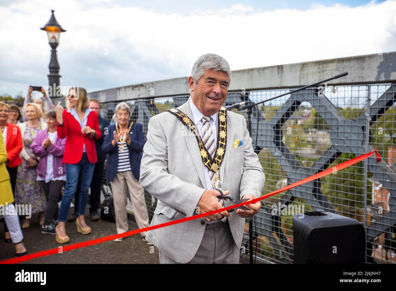Councillor Billy Webb, Mayor of Antrim and Newtownabbey Council cutting ...