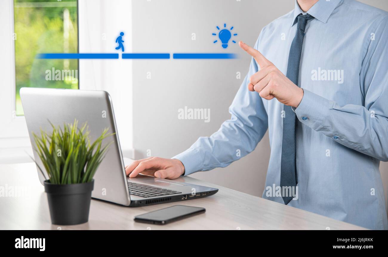 Male business man hand hold a connecting block between two sets of ...