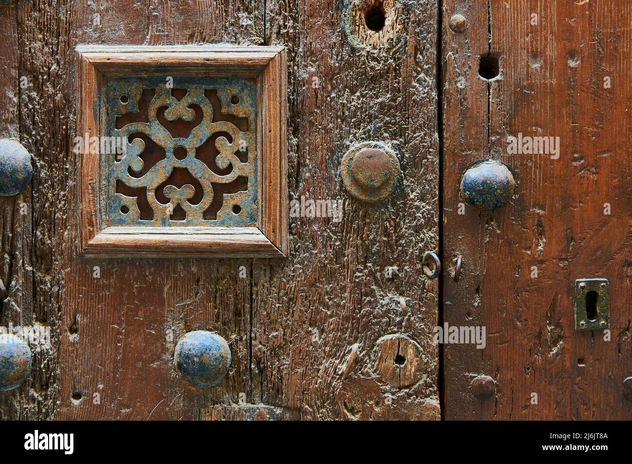 Detail of wooden ancient door with old iron rivets Stock Photo - Alamy
