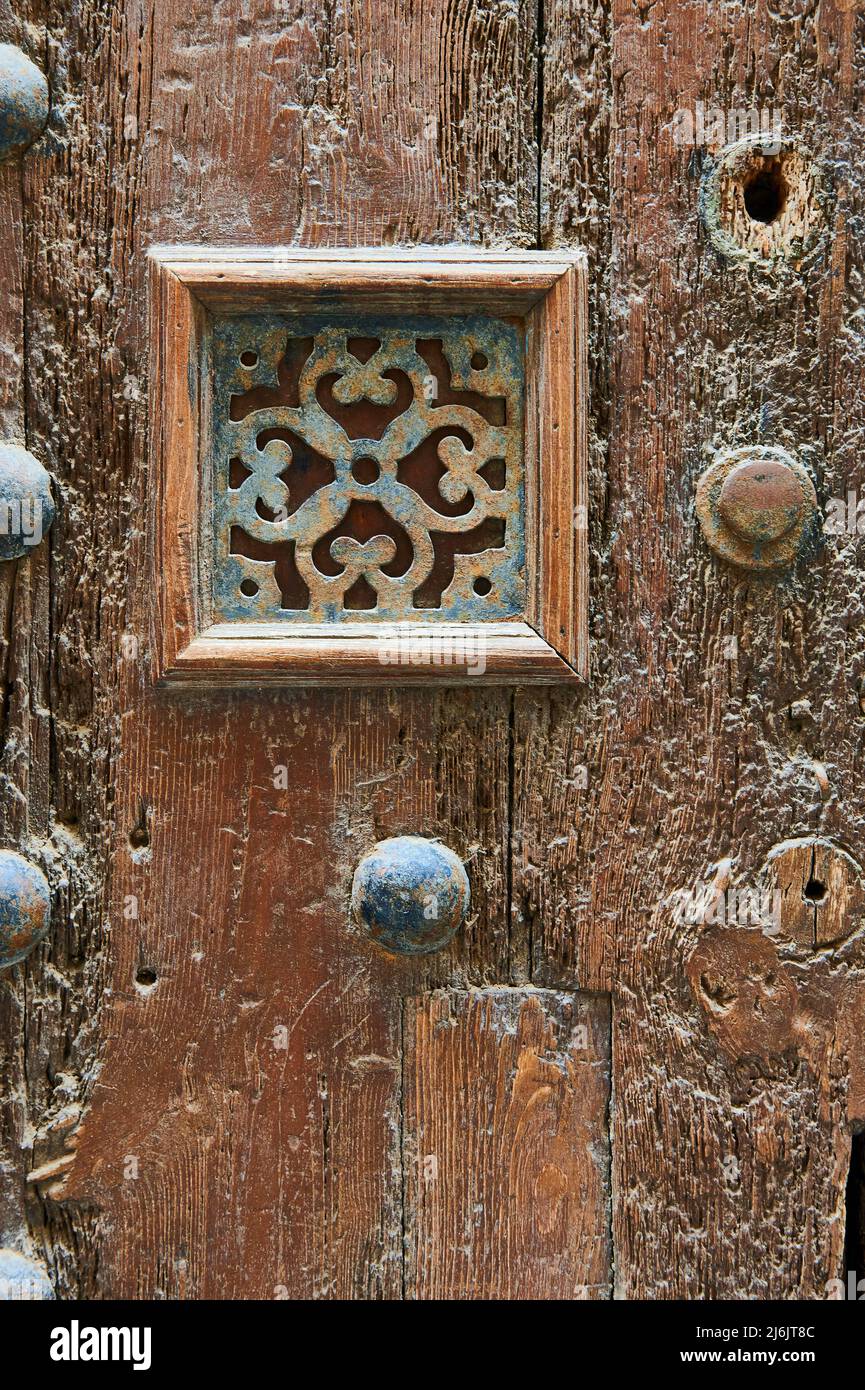 Detail of wooden ancient door with old iron rivets Stock Photo - Alamy