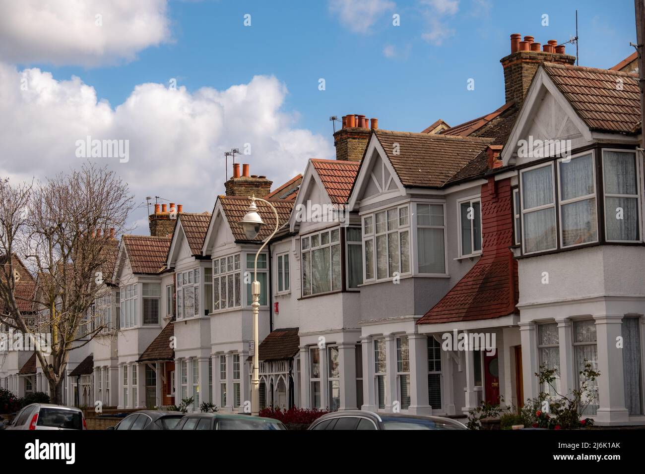 Period white terraced houses with bay windows in Ealing, West London ...
