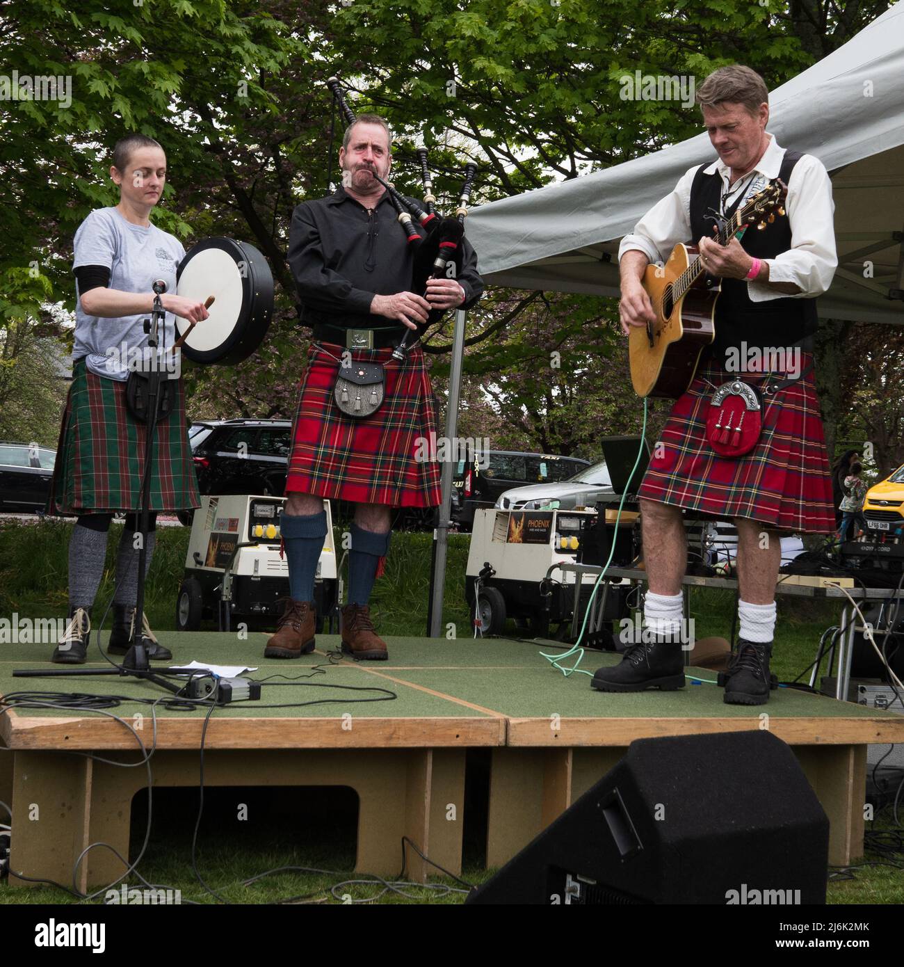 Celtic bagpipe band performing at a MayDay festival in Cardiff, Wales ...