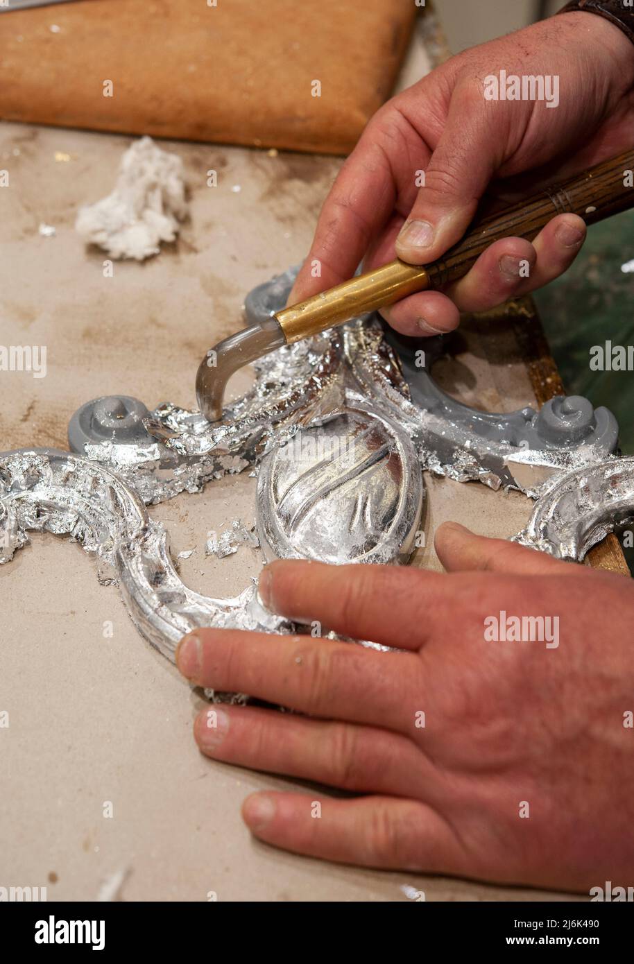 Silvered frame ready for burnishing with an agate stone tool. Silvering ...