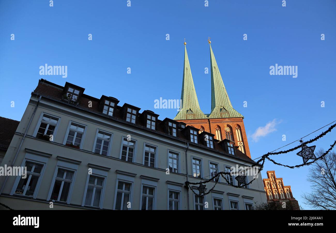 St Nicholas church towers over tenement - Nikolaiviertel - Berlin ...