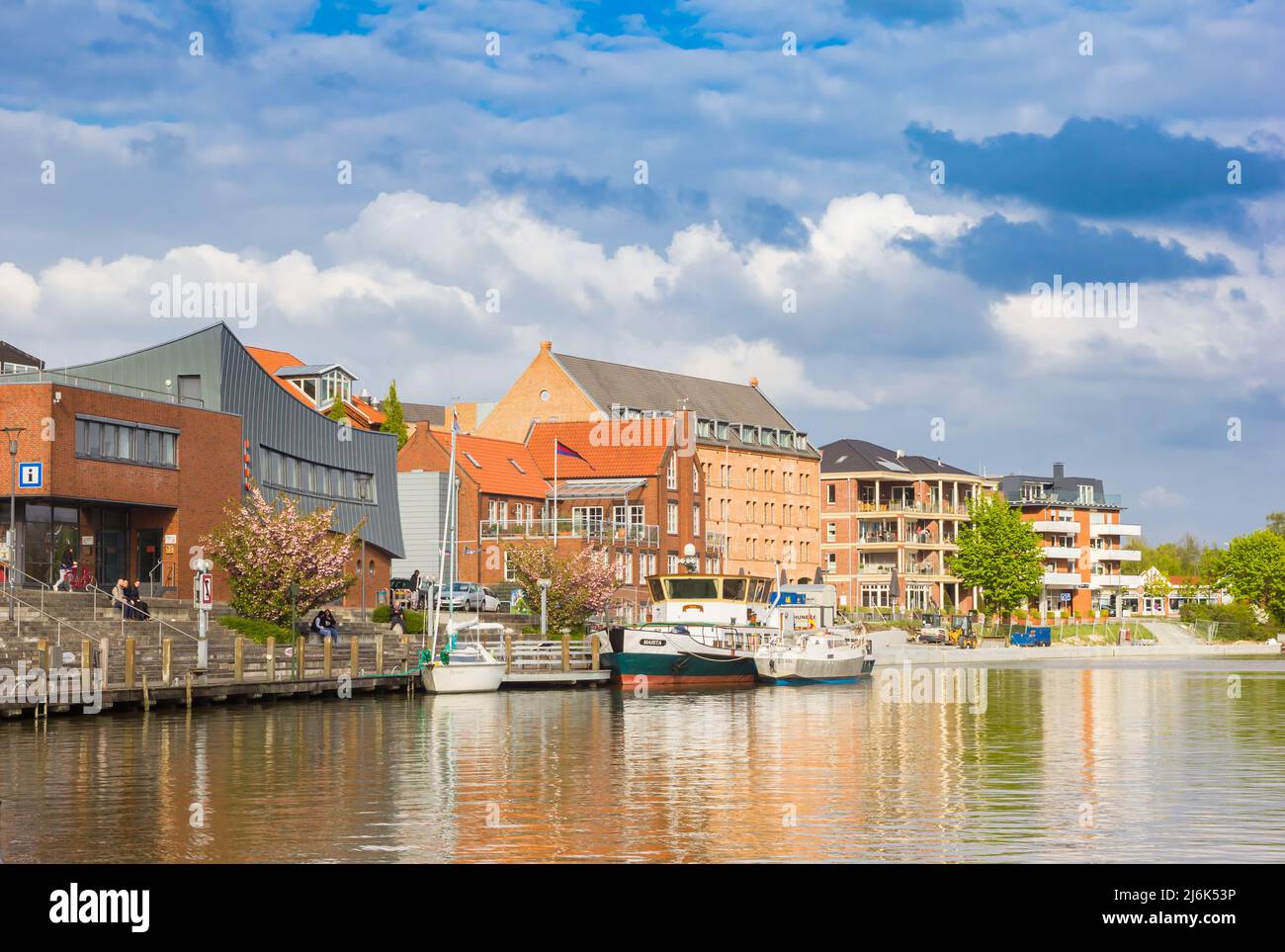 Tourist information and boats at the riverside in Leer, Germany Stock ...