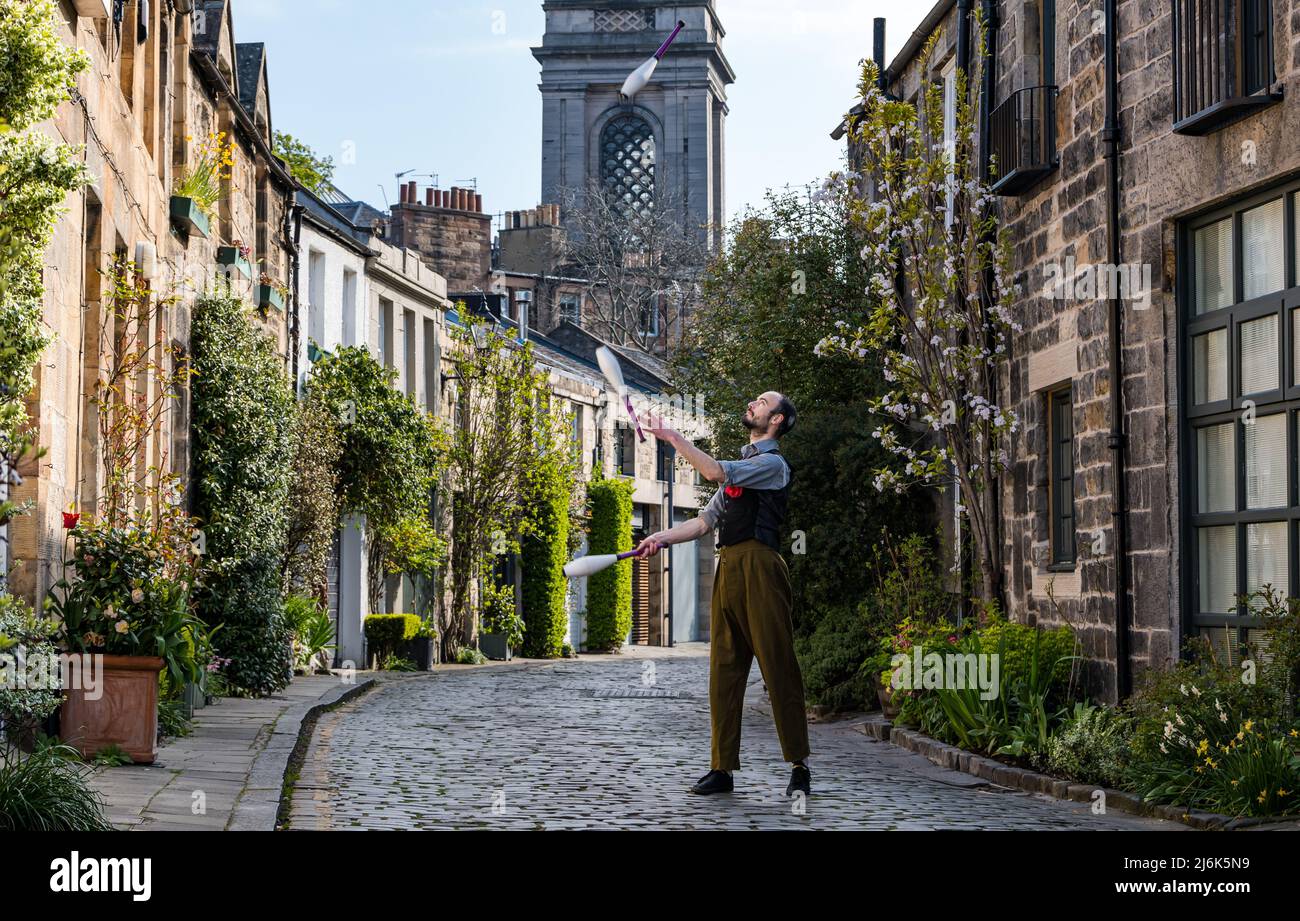 Circus act juggler, Robert Gallagher-Lyall practising juggling clubs ...