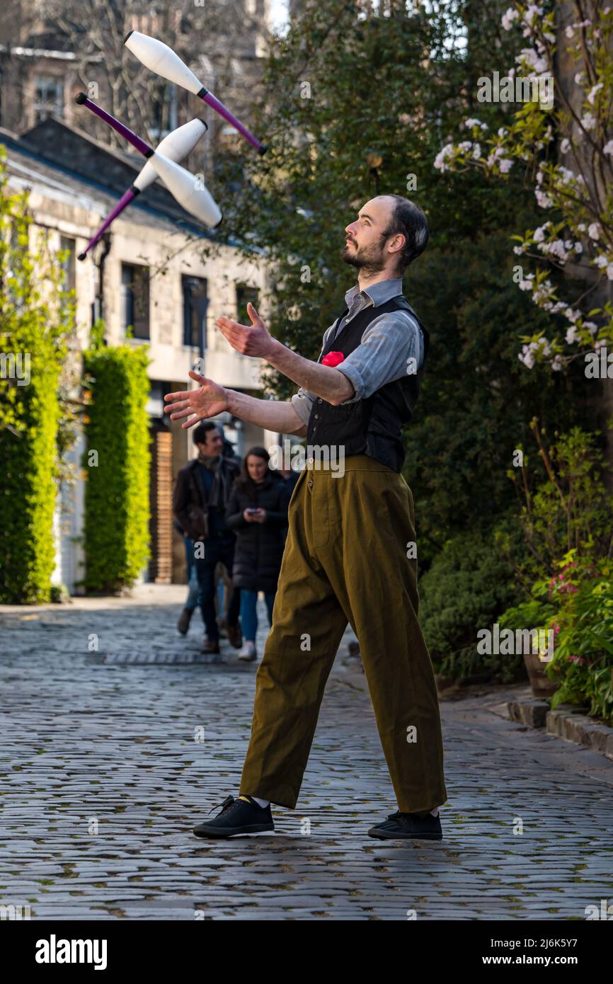 Circus act juggler, Robert Gallagher-Lyall practising juggling clubs ...