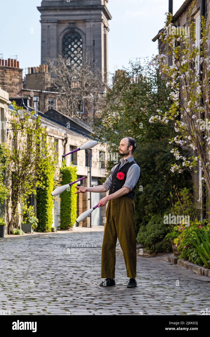 Circus act juggler, Robert Gallagher-Lyall practising juggling clubs ...