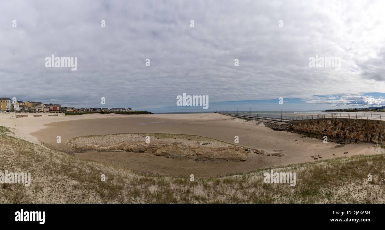 Foz, Spain - 21 April, 2022: panorama view of Foz beach and town at low ...