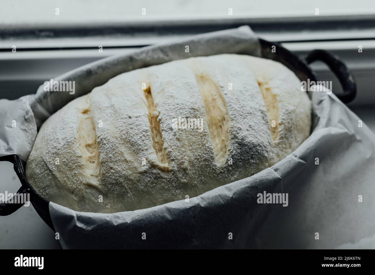 Raw bread dough in the mold ready for baking Stock Photo - Alamy