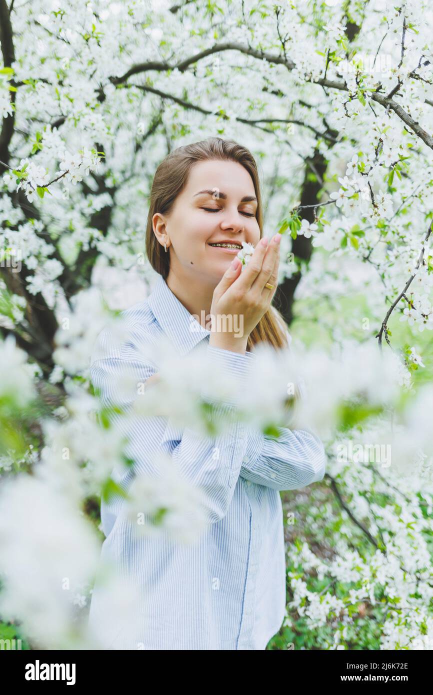 Portrait of beautiful romantic lady in apple trees blossoms Stock Photo ...