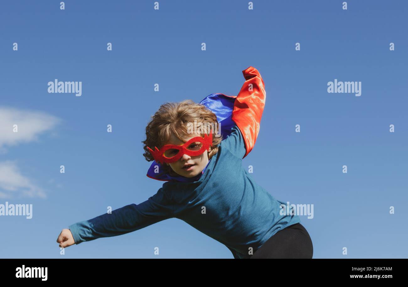 Super jump. Excited child boy dressed like superhero. Super hero ...