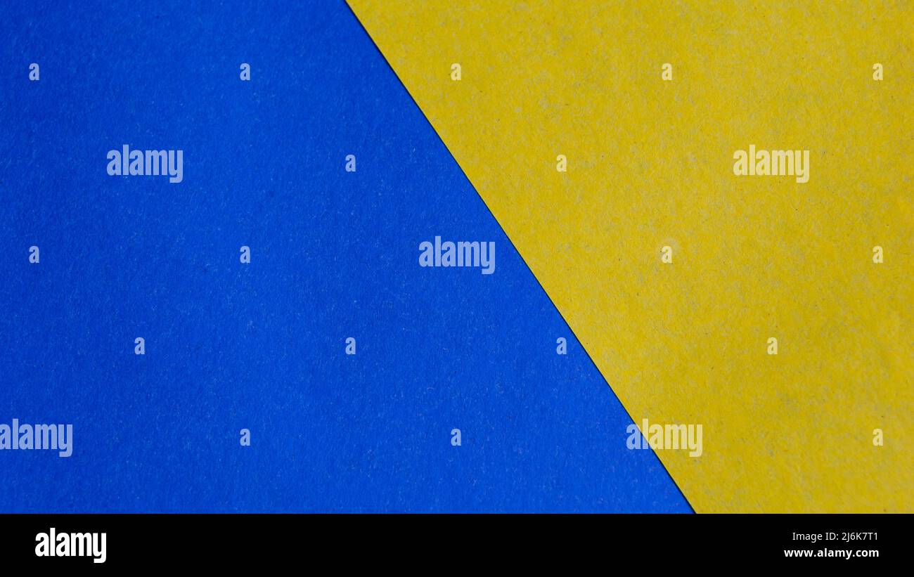 blue and yellow paper color for background. Paper textured abstract ...
