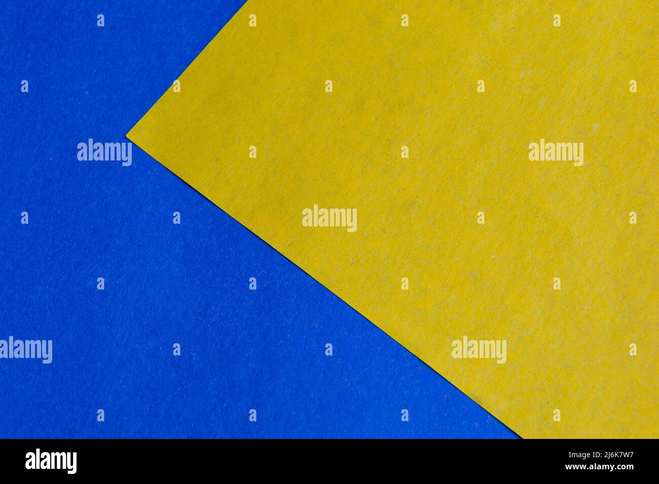 blue and yellow paper color for background. Paper textured abstract ...