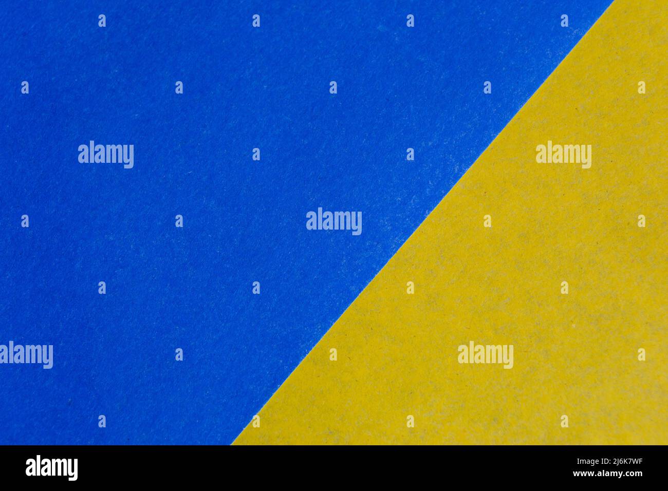 blue and yellow paper color for background. Paper textured abstract ...
