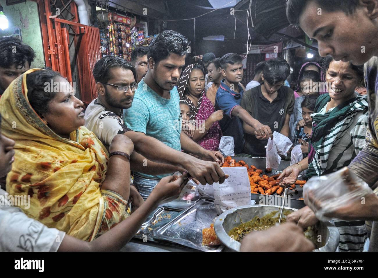 Dhaka, Bangladesh. 2nd May 2022. People at the Bihari Camp cooking food ...