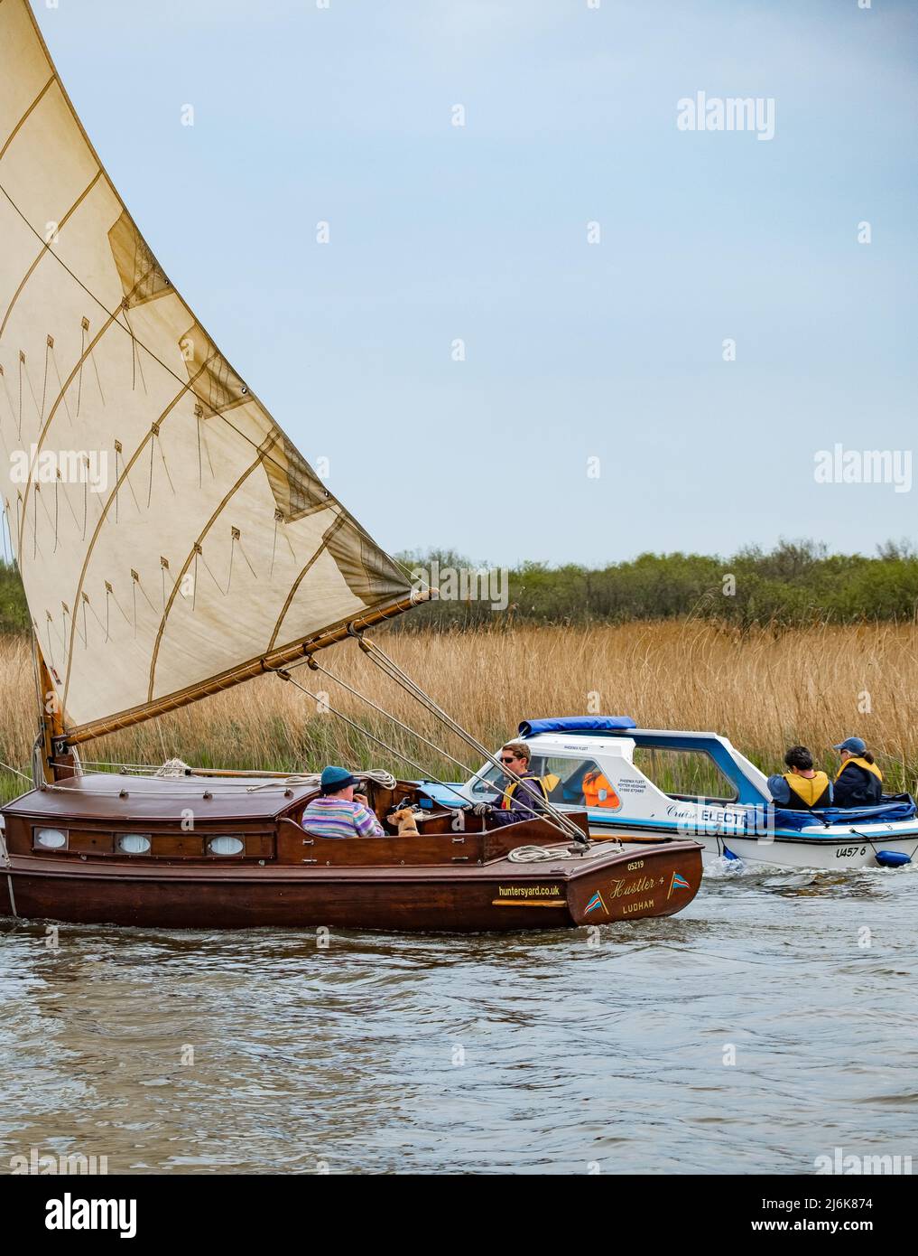 Traditional wooden sailboat sailing along the River Bure, Norfolk ...