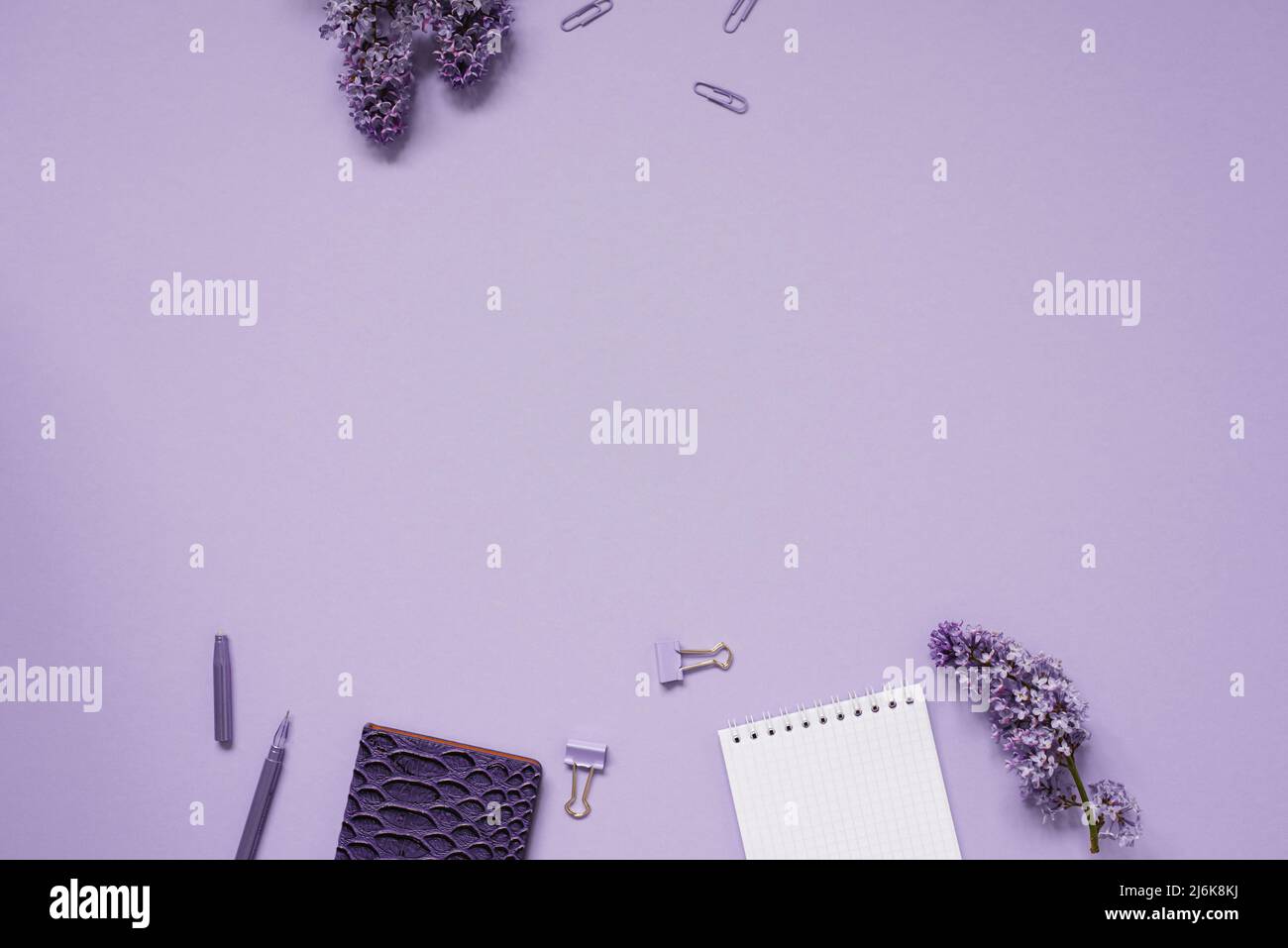 notepad and pen, paper clips and clips with a layout of the place to ...